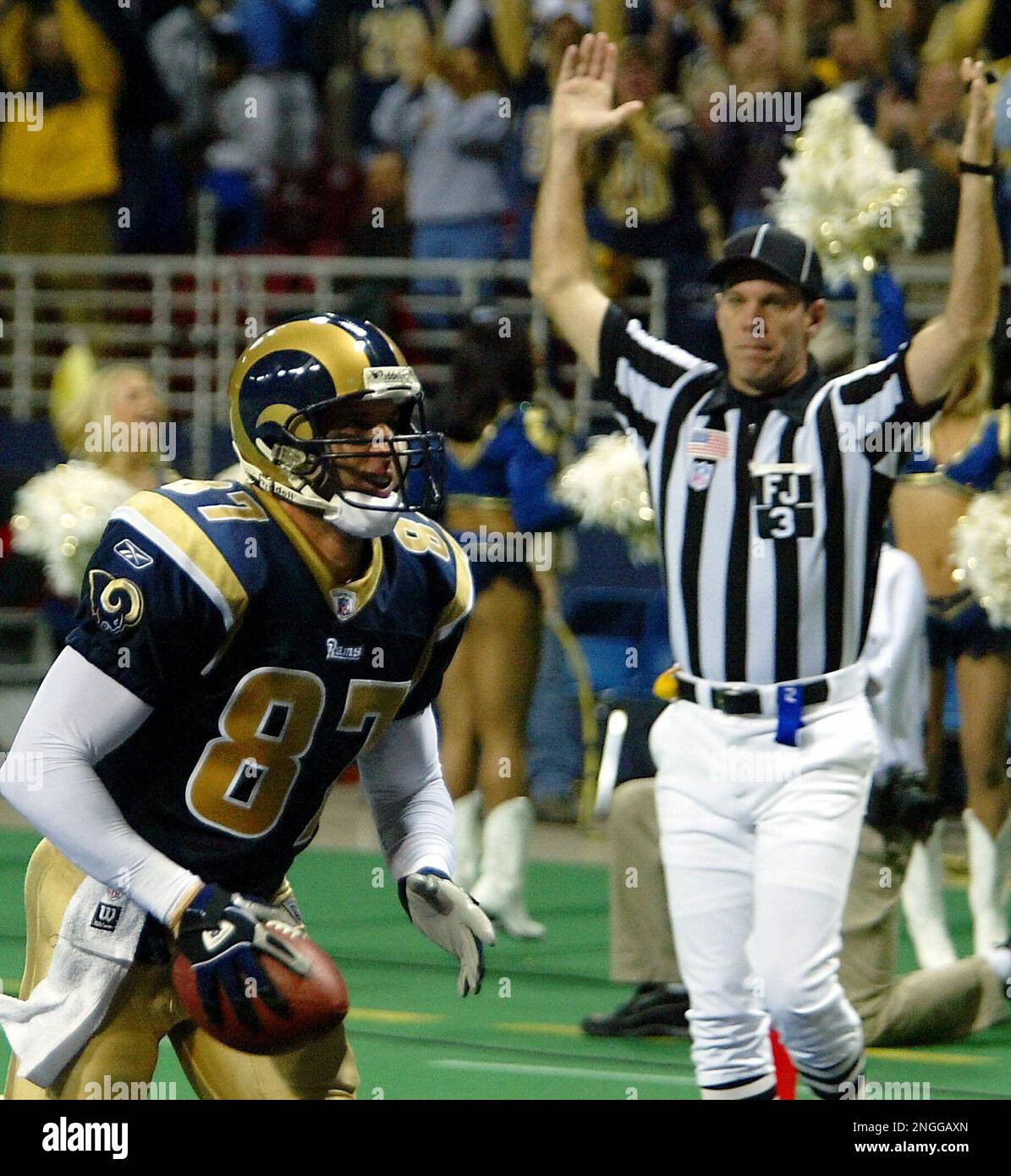 St. Louis Rams' Ricky Proehl starts to celebrate as field judge Scott ...