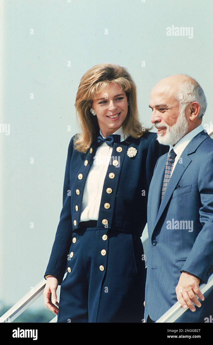 Queen Noor of Jordan and King Hussein arrive at Orly airport, south of ...