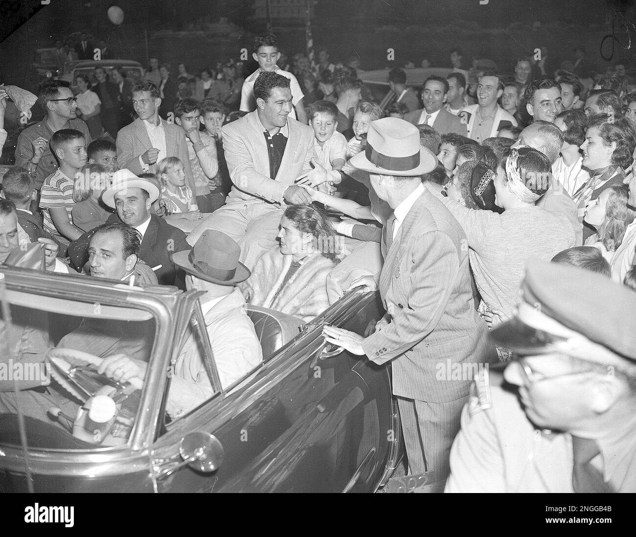 Shaking hands and smiling, the new world heavyweight boxing champion ...