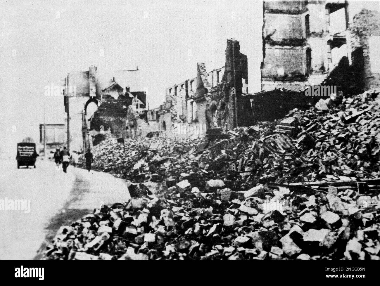 This street scene shows the damage which resulted from air raids by the ...