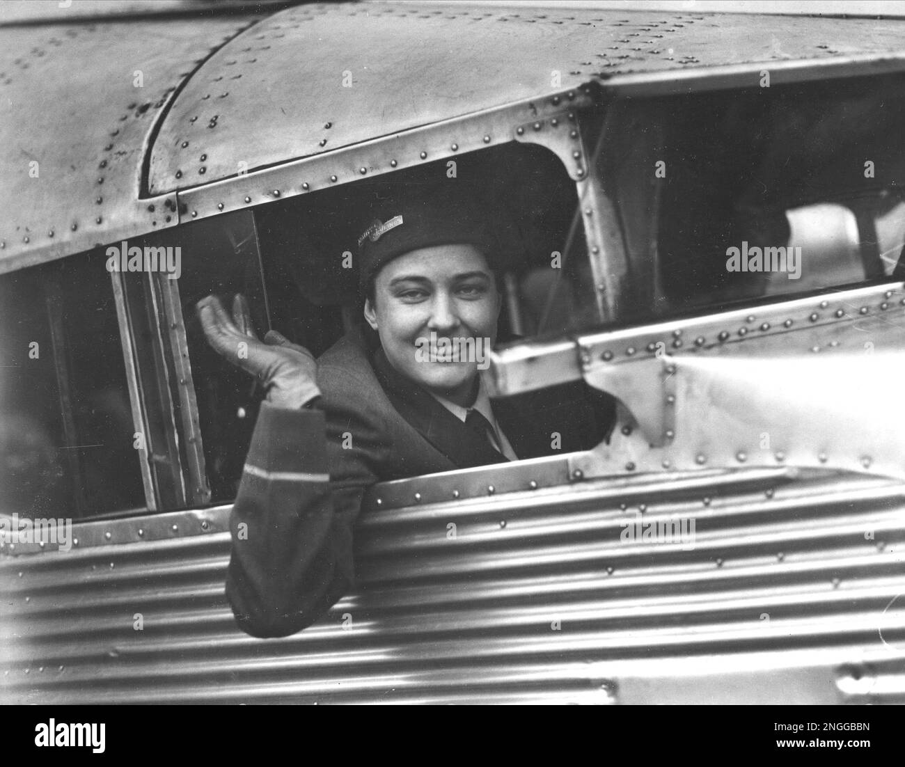 Helen Richey, Pittsburgh aviatrix, is shown in the cockpit of a Central ...