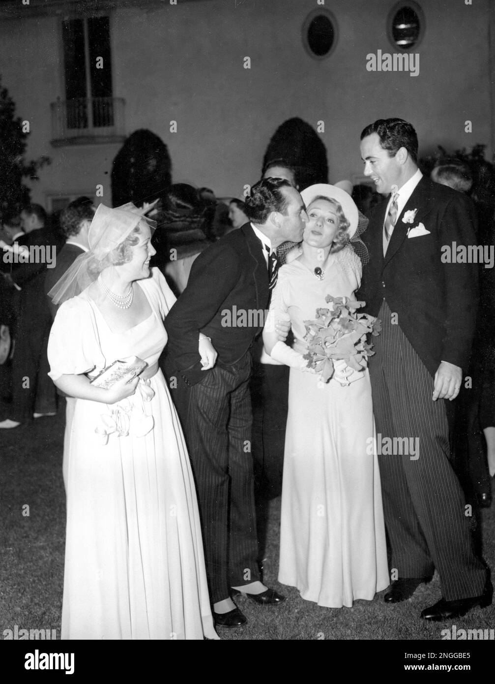 Actor-comedian Harold Lloyd kisses actress Mary Pickford at the ...
