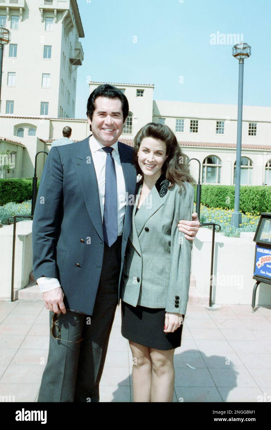 Singer Wayne Newton poses with Marla Heasley as they leave the ...