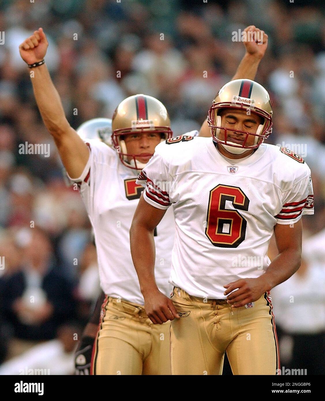 San Francisco 49ers' holder Jason Baker pumps his fists after kicker ...