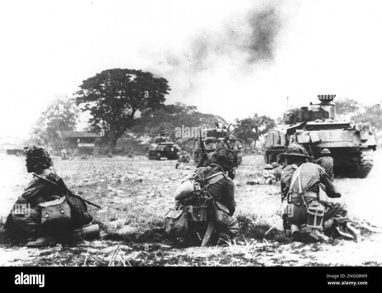 Tanks and infantrymen of the Indian Army, British Imperial Forces, are ...