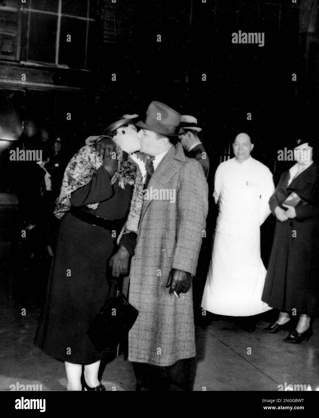 Anna Sage kisses her son Steve Chiolak goodbye as she is deported home ...