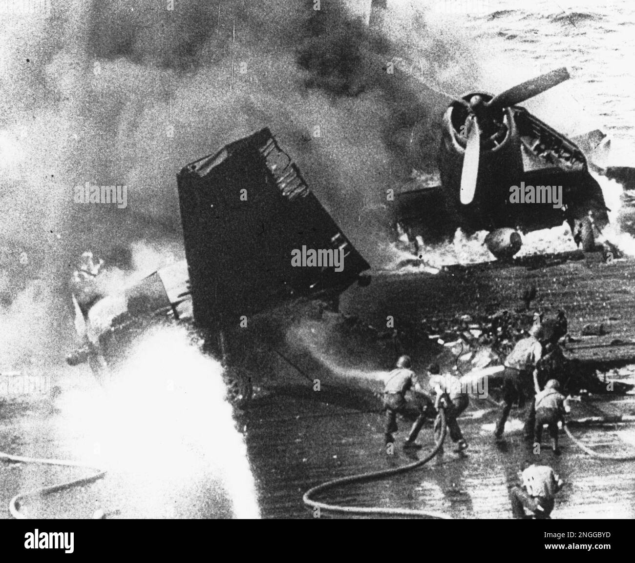 After Japanese bombers hit and set fire to the aircraft on the flight ...