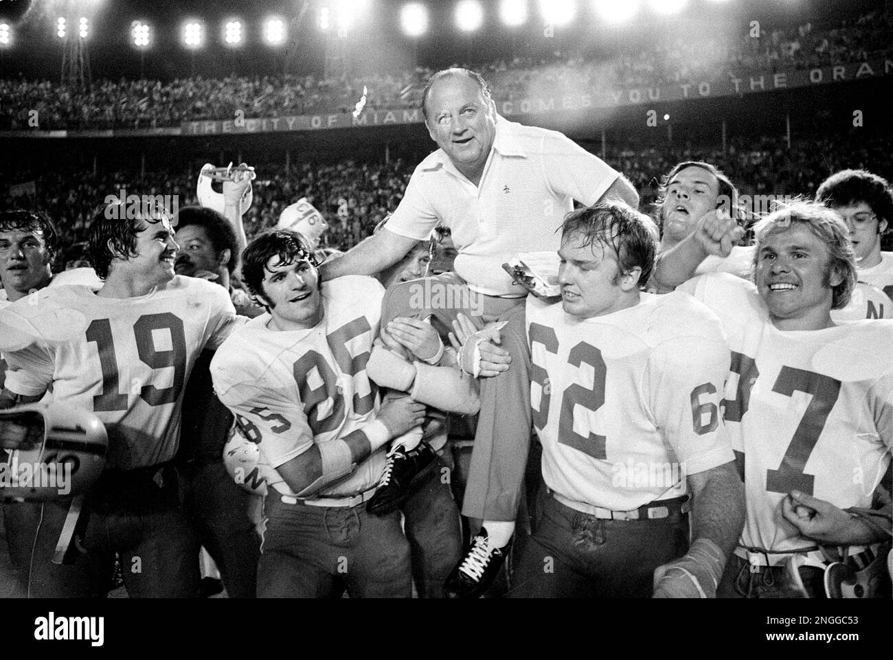 Nebraska coach Bob Devaney is carried across the Orange Bowl after his ...