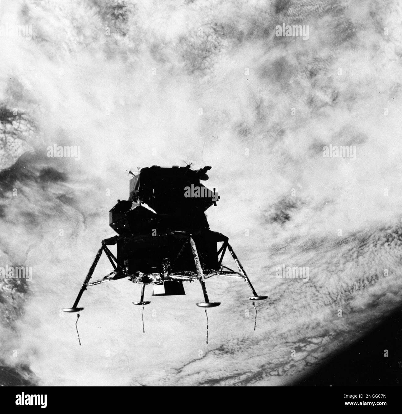 The Apollo 9 lunar module is shown in flight after separation from the ...