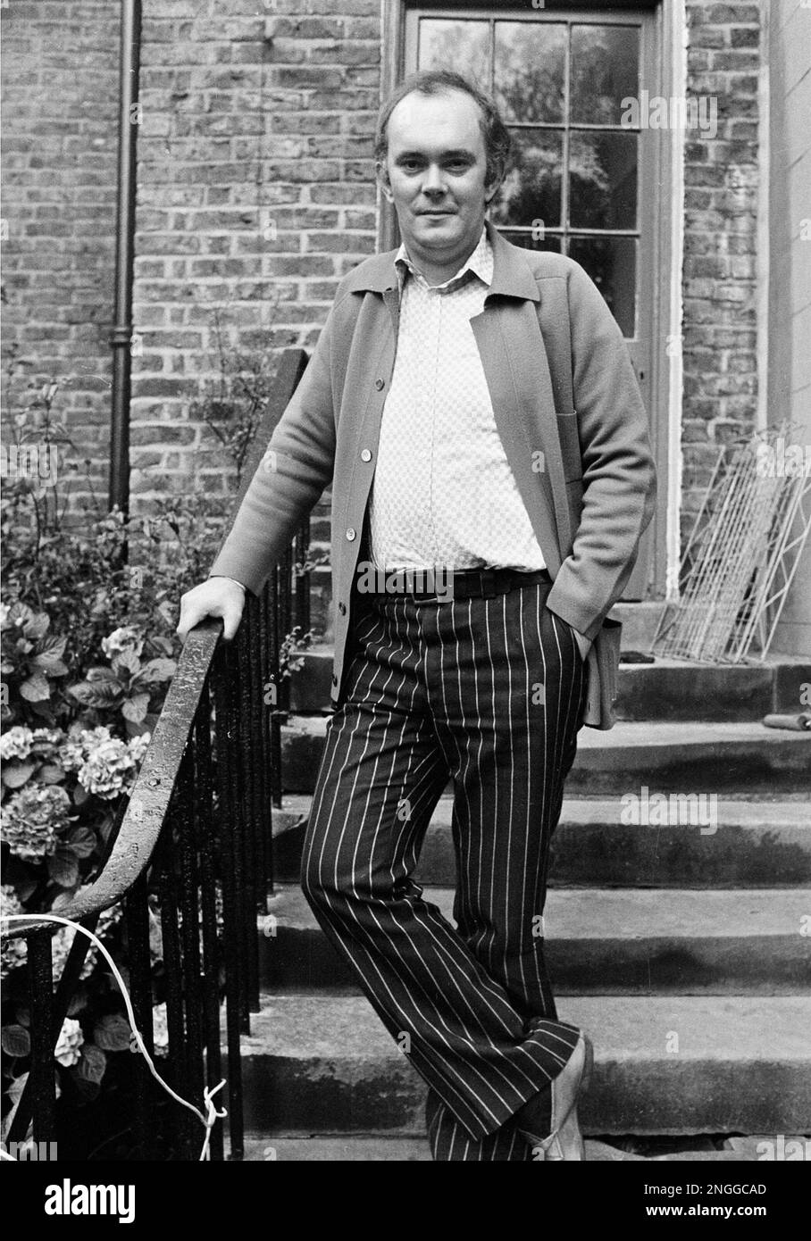 British playwright Alan Ayckbourn is shown on the steps of his home in ...