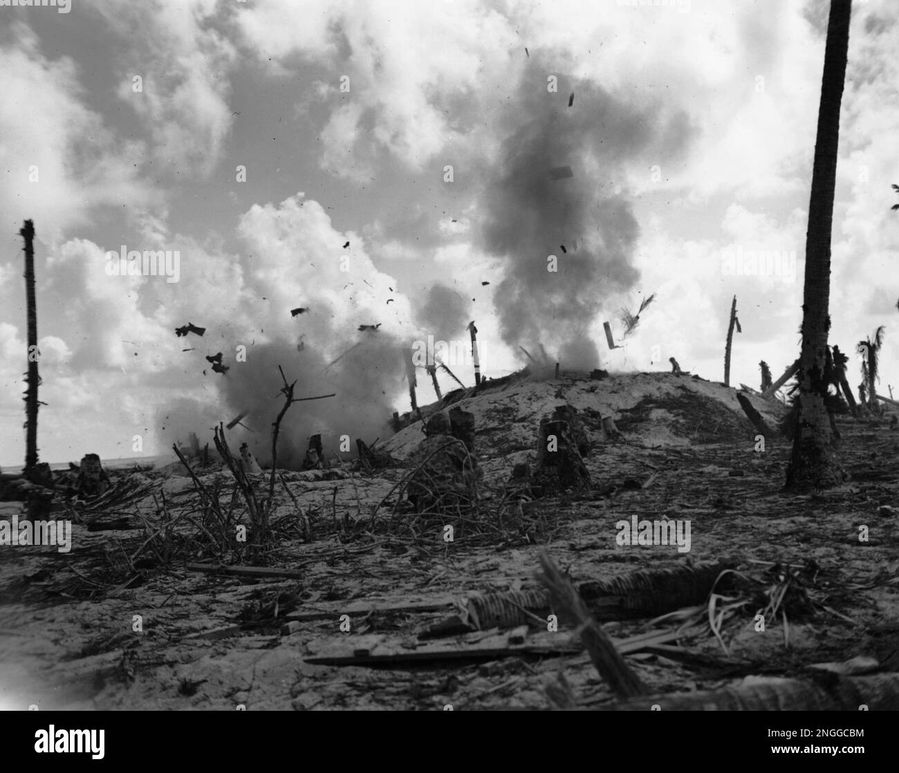 U.S. Marines are blowing up a Japanese pillbox during the invasion at ...