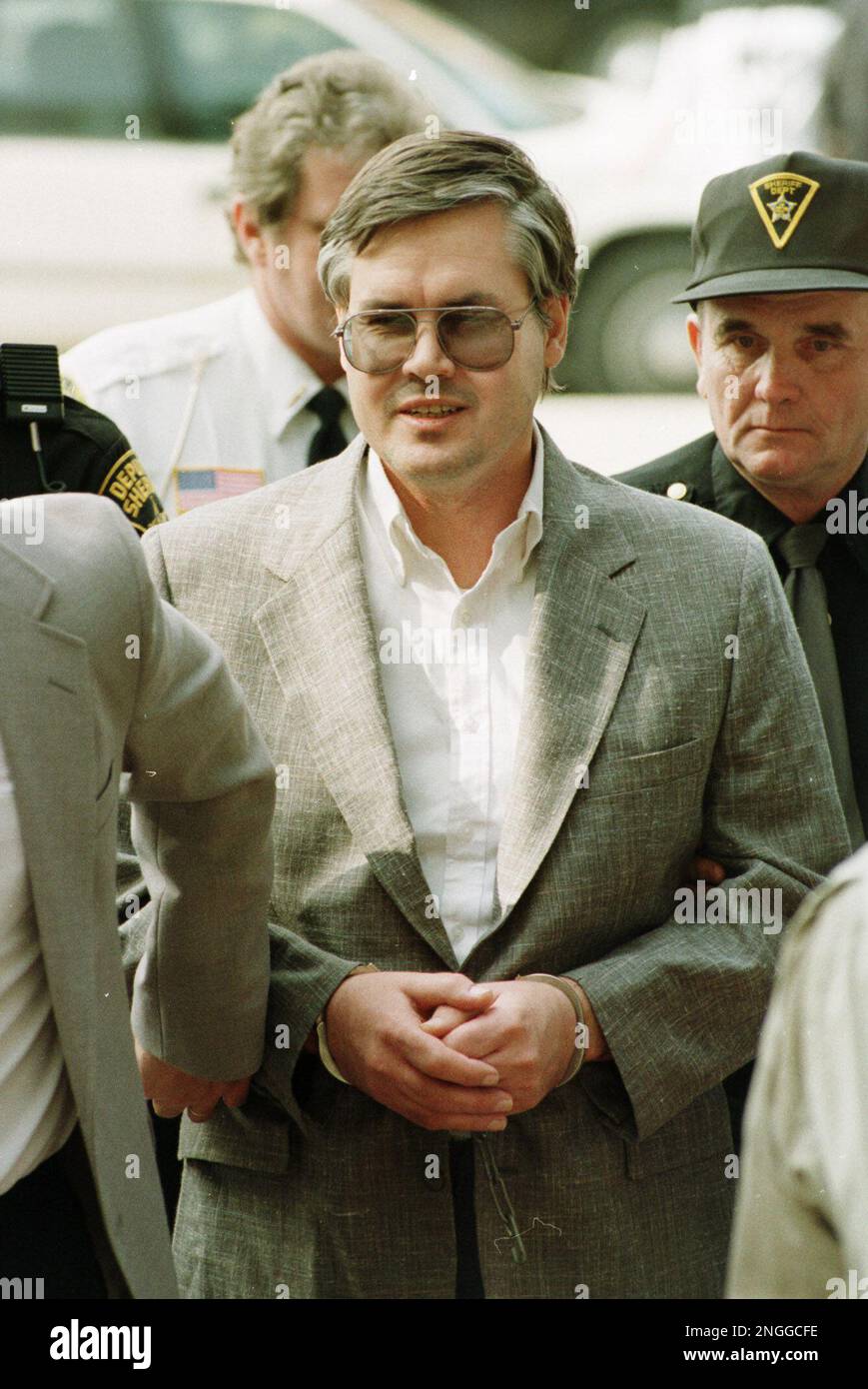 Thomas Dillon is led into the Noble County Courthouse in Caldwell, Ohio, on Feb. 9, 1993. Dillon ...