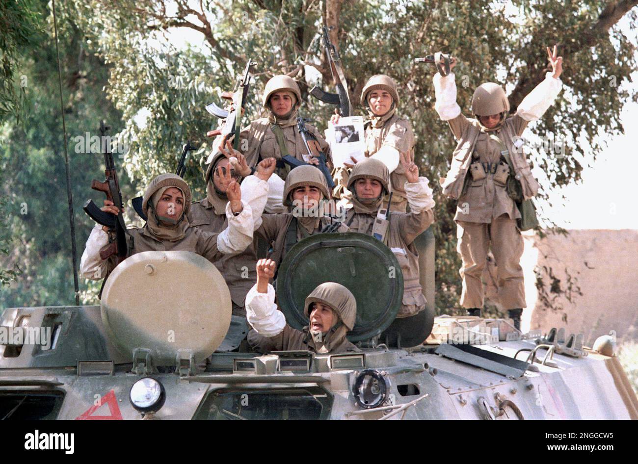 Helmeted Iranian women troopers of the National Liberation Army ...