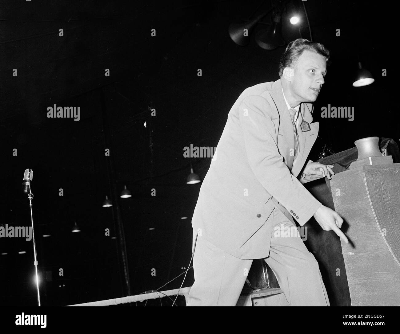 Thirty-year-old evangelist Billy Graham gestures as he speaks to a ...