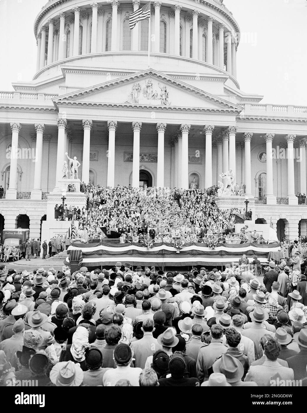 Evangelist Billy Graham addresses a crowd at a religious rally in front ...
