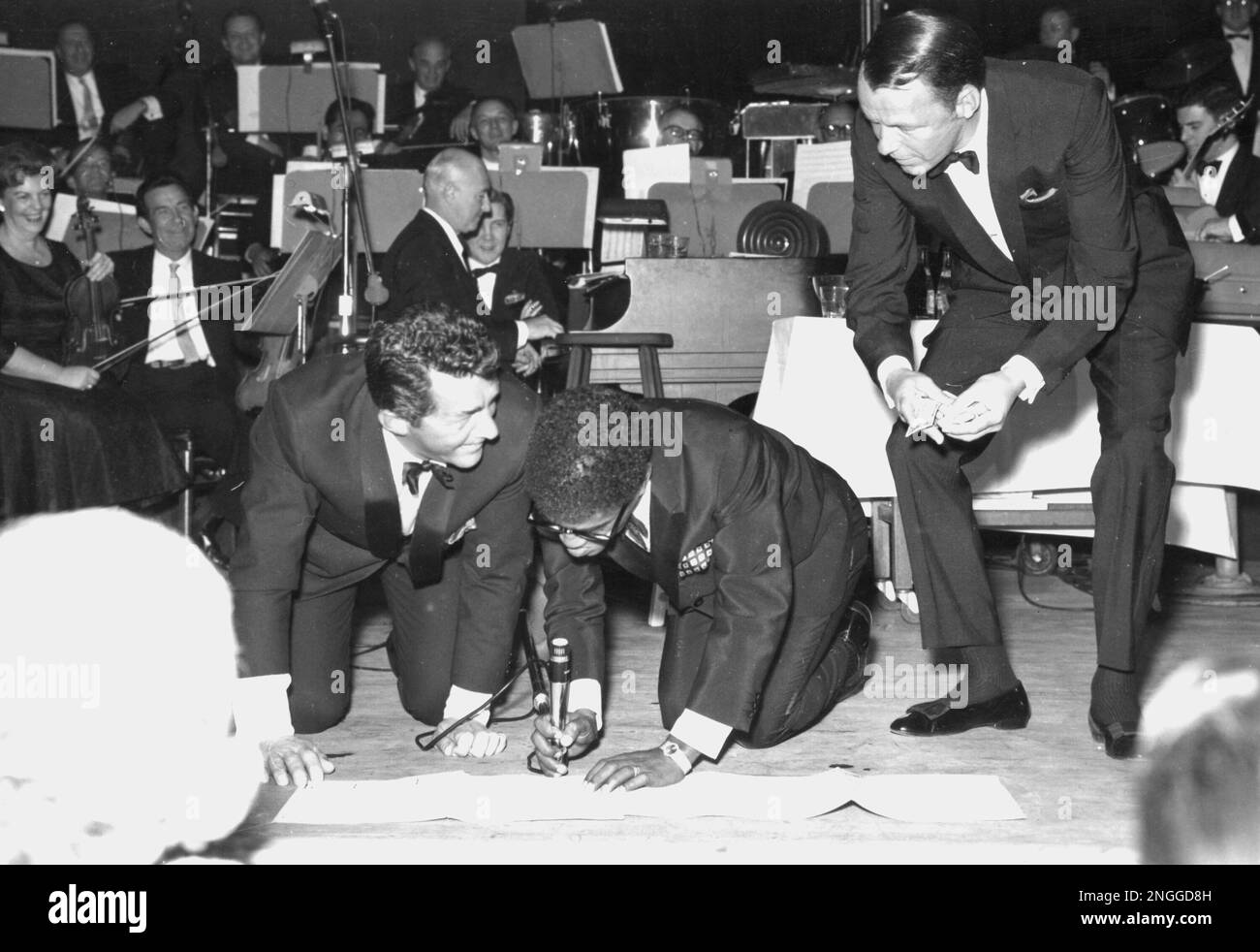 Dean Martin, left, Sammy Davis Jr., center, and Frank Sinatra, called ...