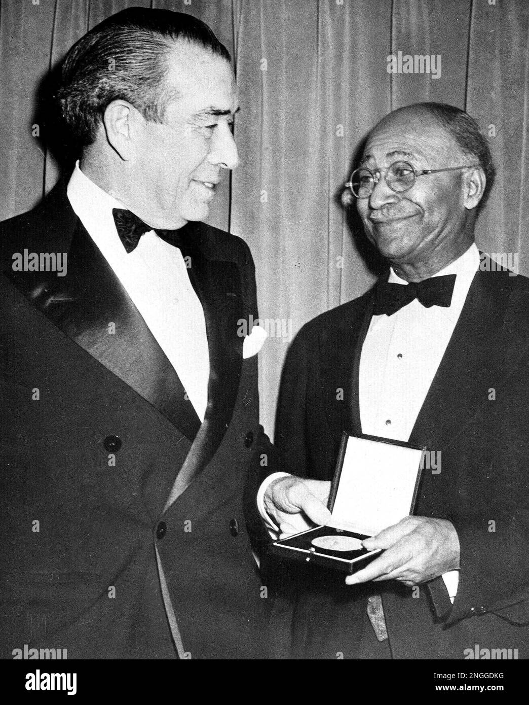Matthew Alexander Henson, right, receives the gold medal of the ...