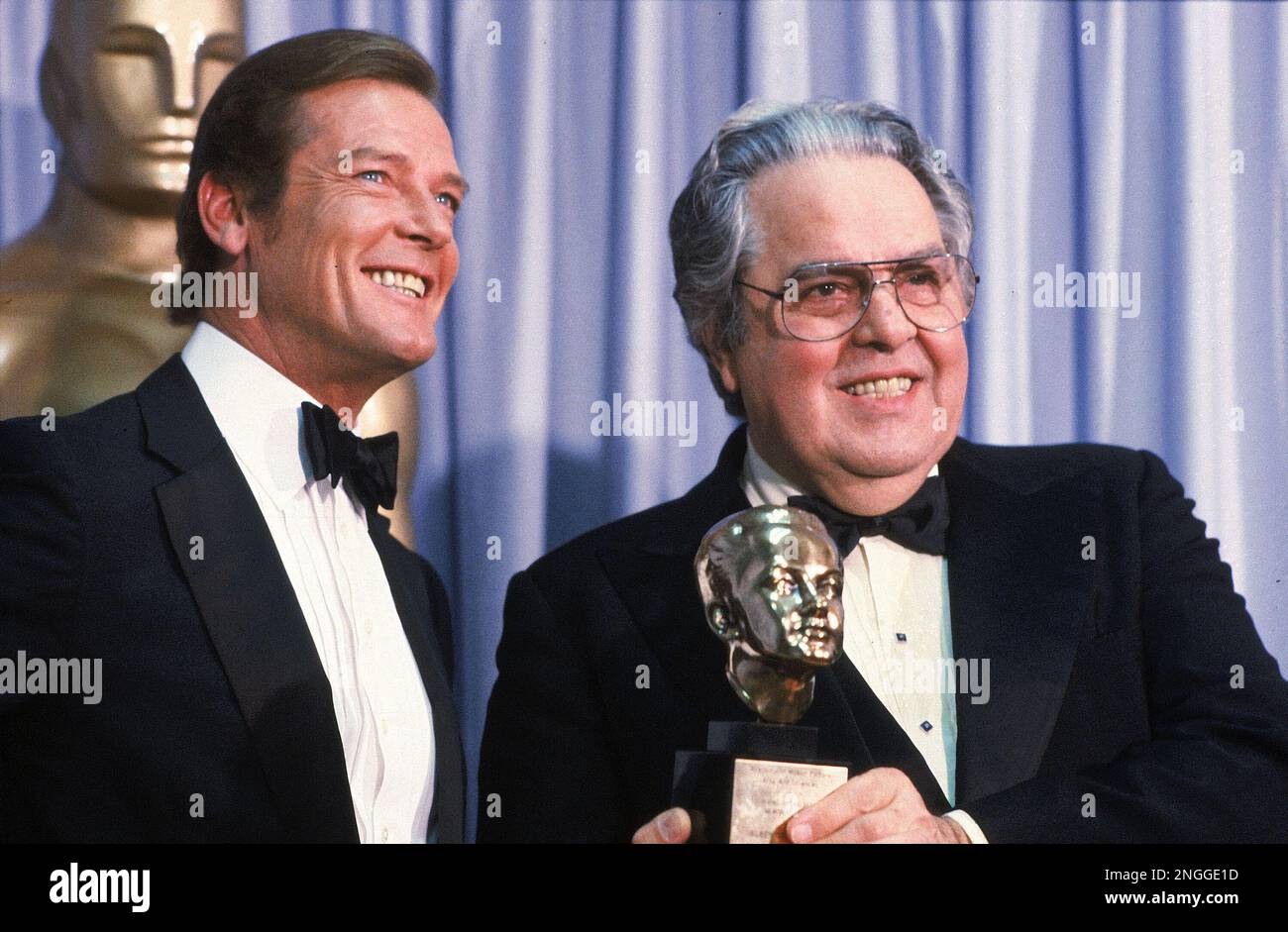 Albert "Cubby" Broccoli, producer of the "James Bond" series, holds the ...