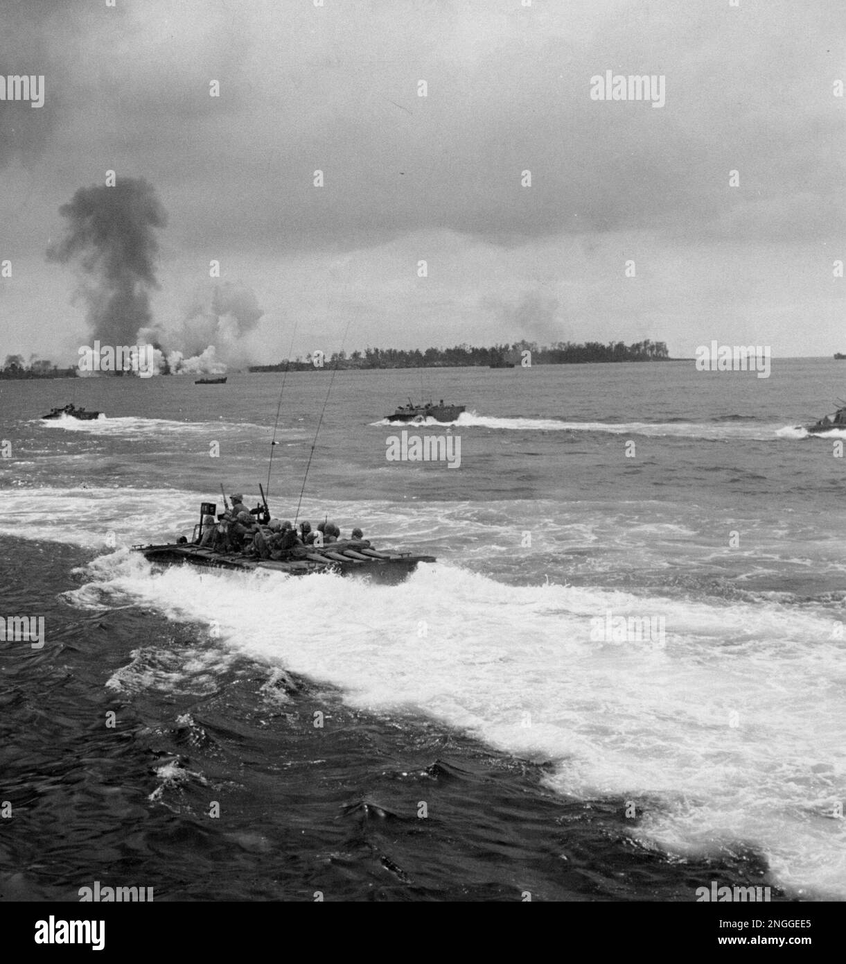 U.S. Marines in amphibious tanks approach the shore of Peleliu island ...