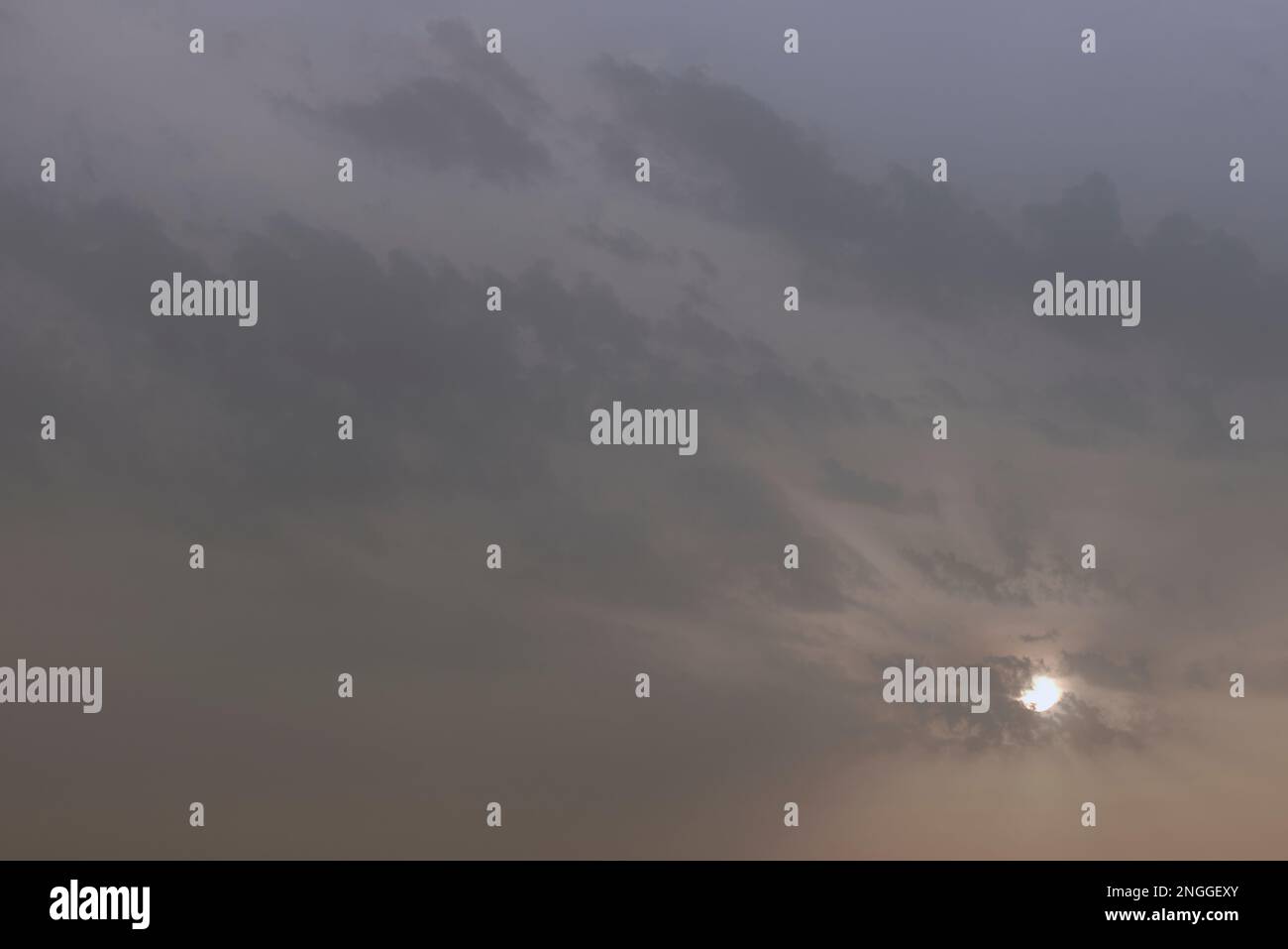 Sky, with diffused sun clouds colourful Stock Photo - Alamy