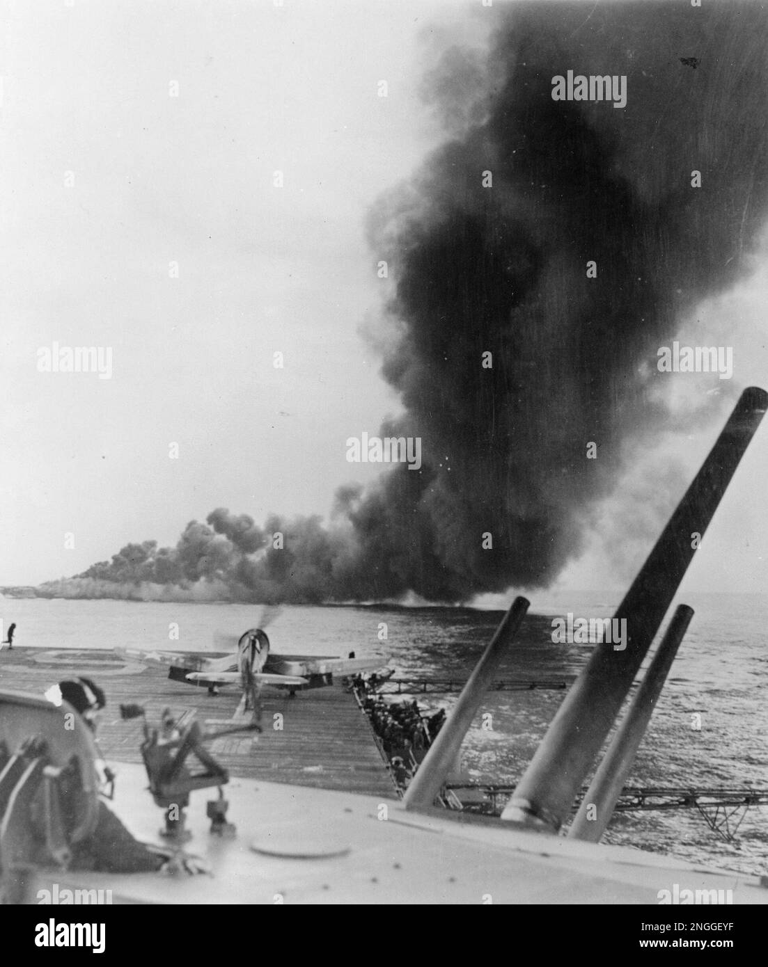 Aircraft carrier USS Hancock is seen afire, on August 20, 1945, after ...