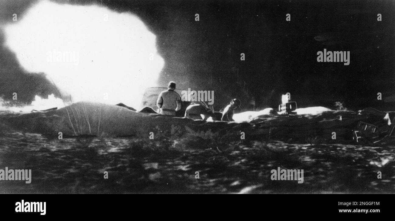 A powerfull 25-pounder gun is fired by a British artillery crew, on ...
