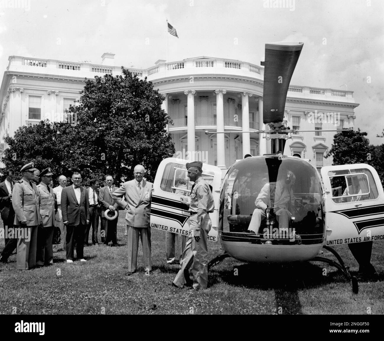 U.S. President Dwight Eisenhower stands beside the new presidential ...