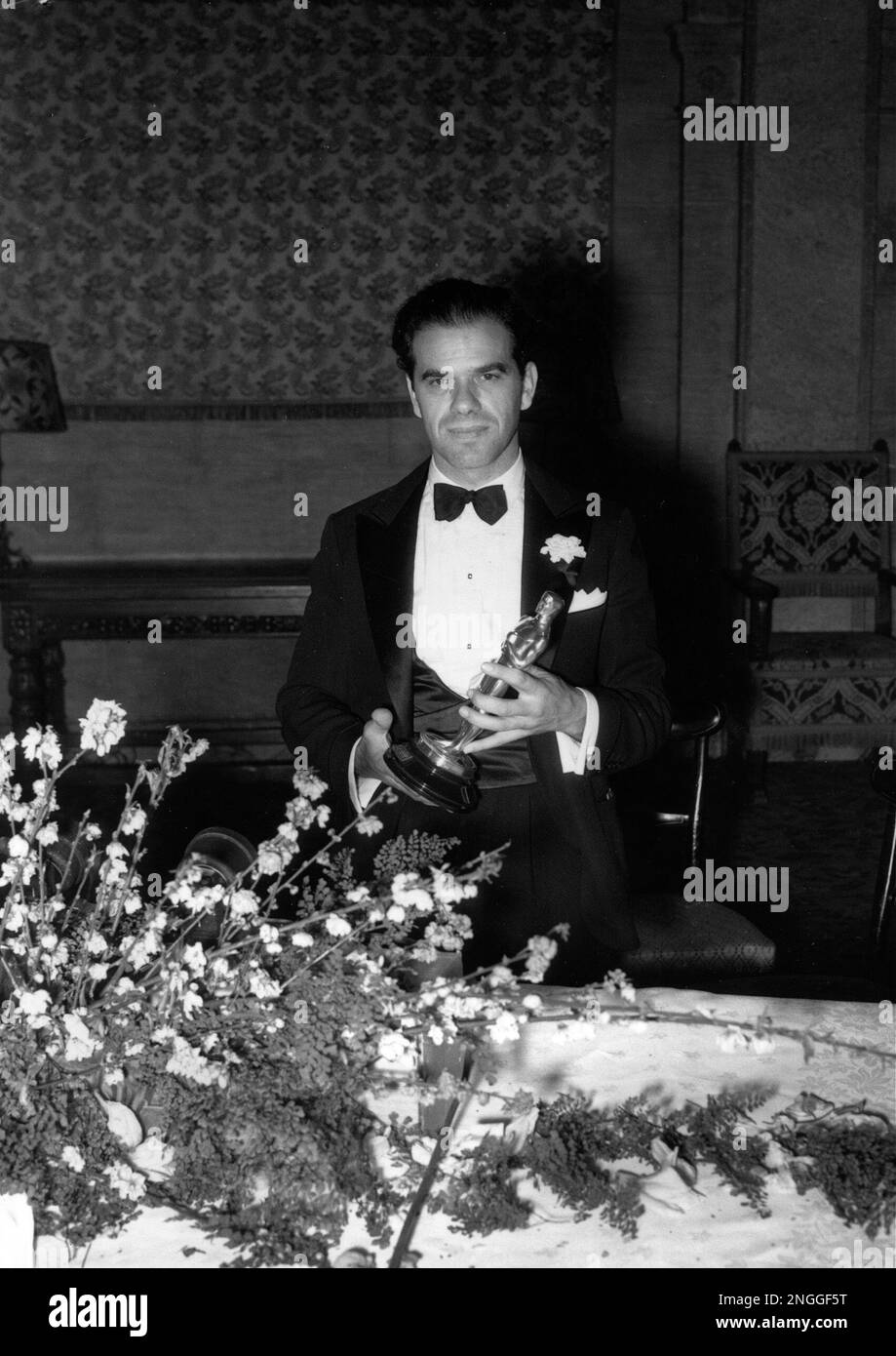 Frank Capra poses with his special Oscar at the Academy Awards in Los ...