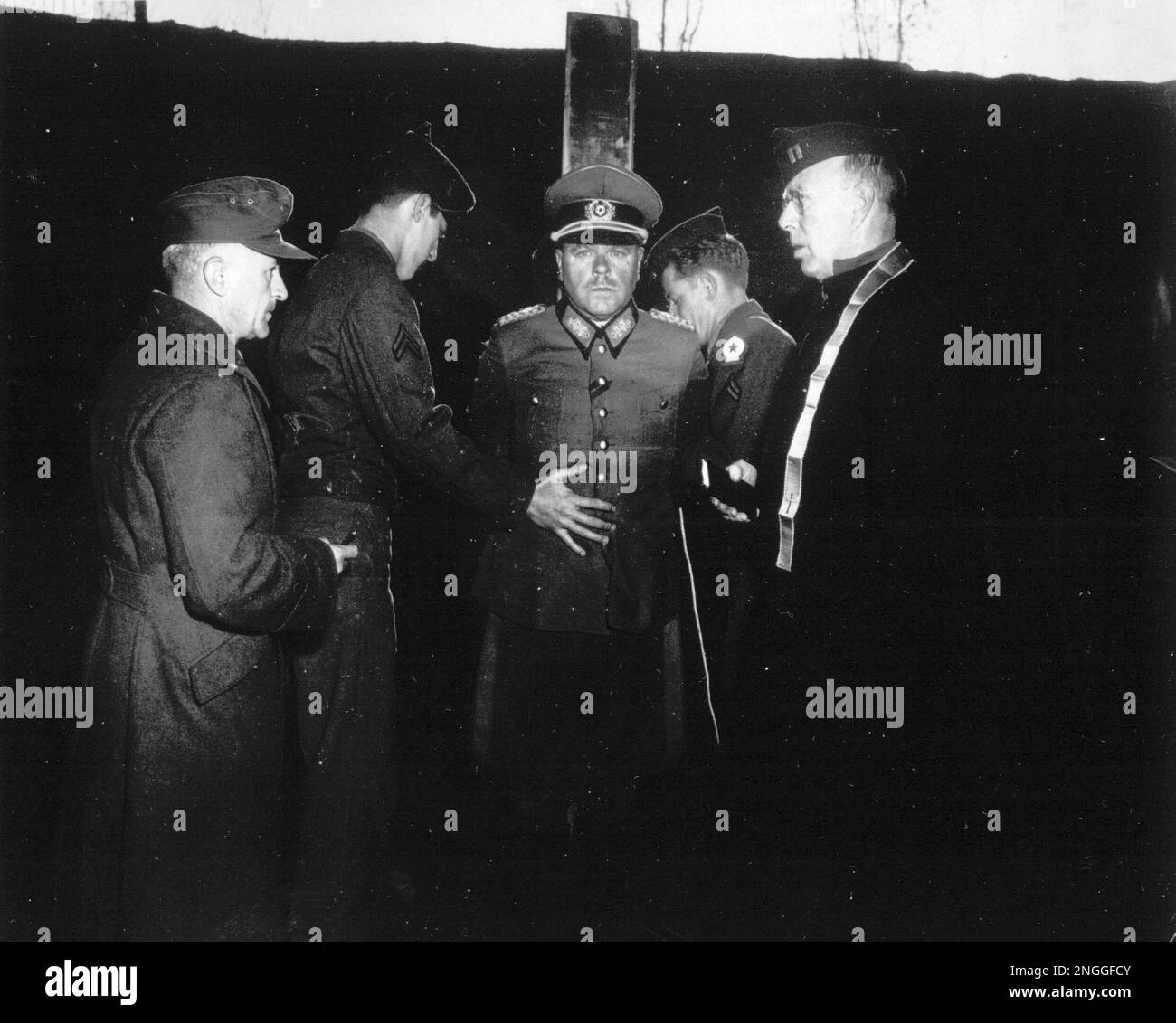 German Wehrmacht Gen. Anton Dostler is tied to a stake before his ...