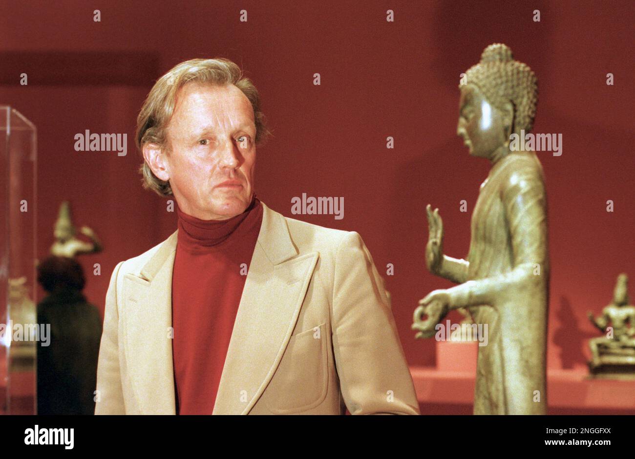 Author and adventurer Colin Thubron poses near a statue of Buddha at ...