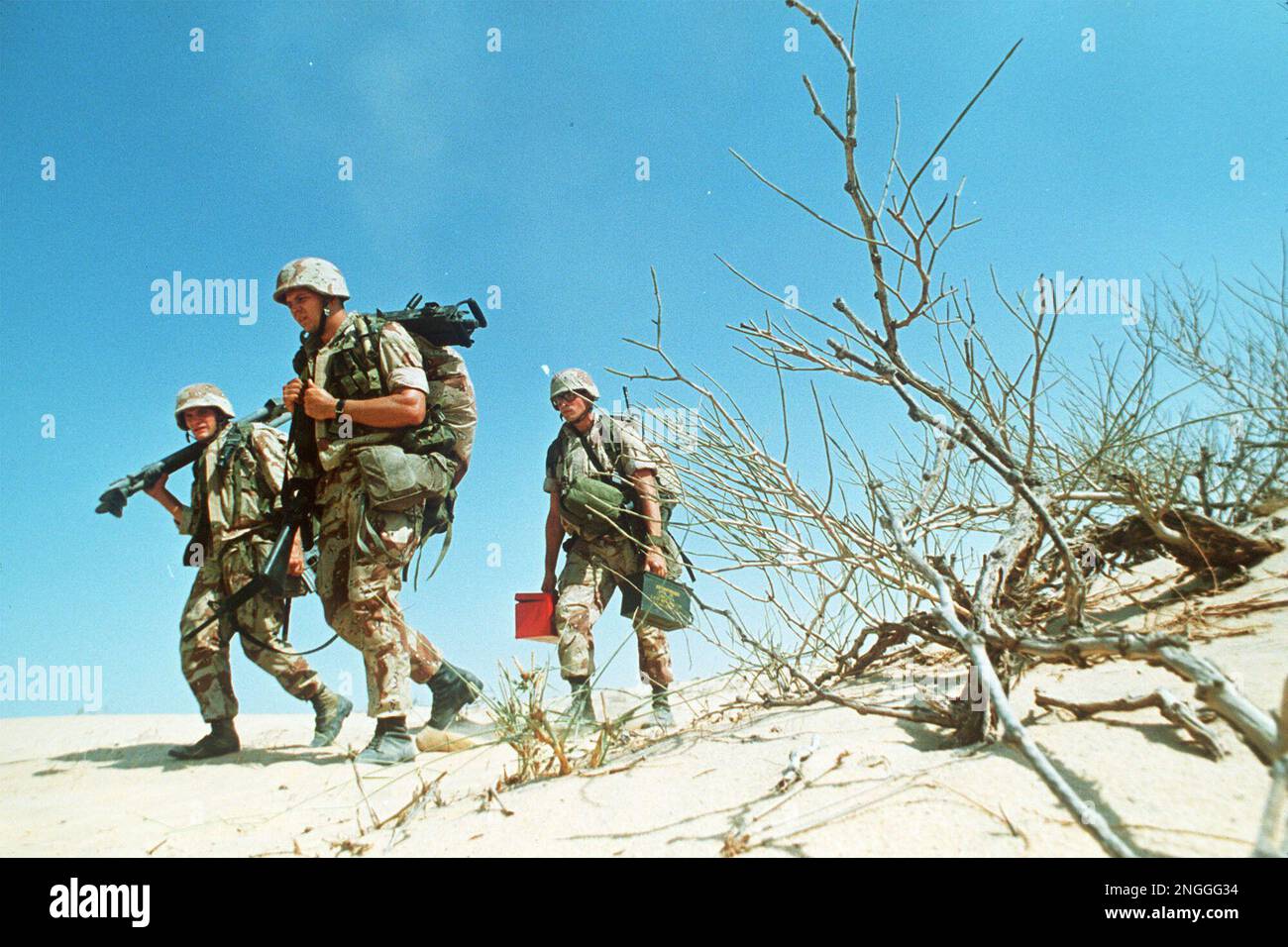 DESERT MARCH -- U.S. Marines from the 1st Battalion, 6th Regiment, make ...