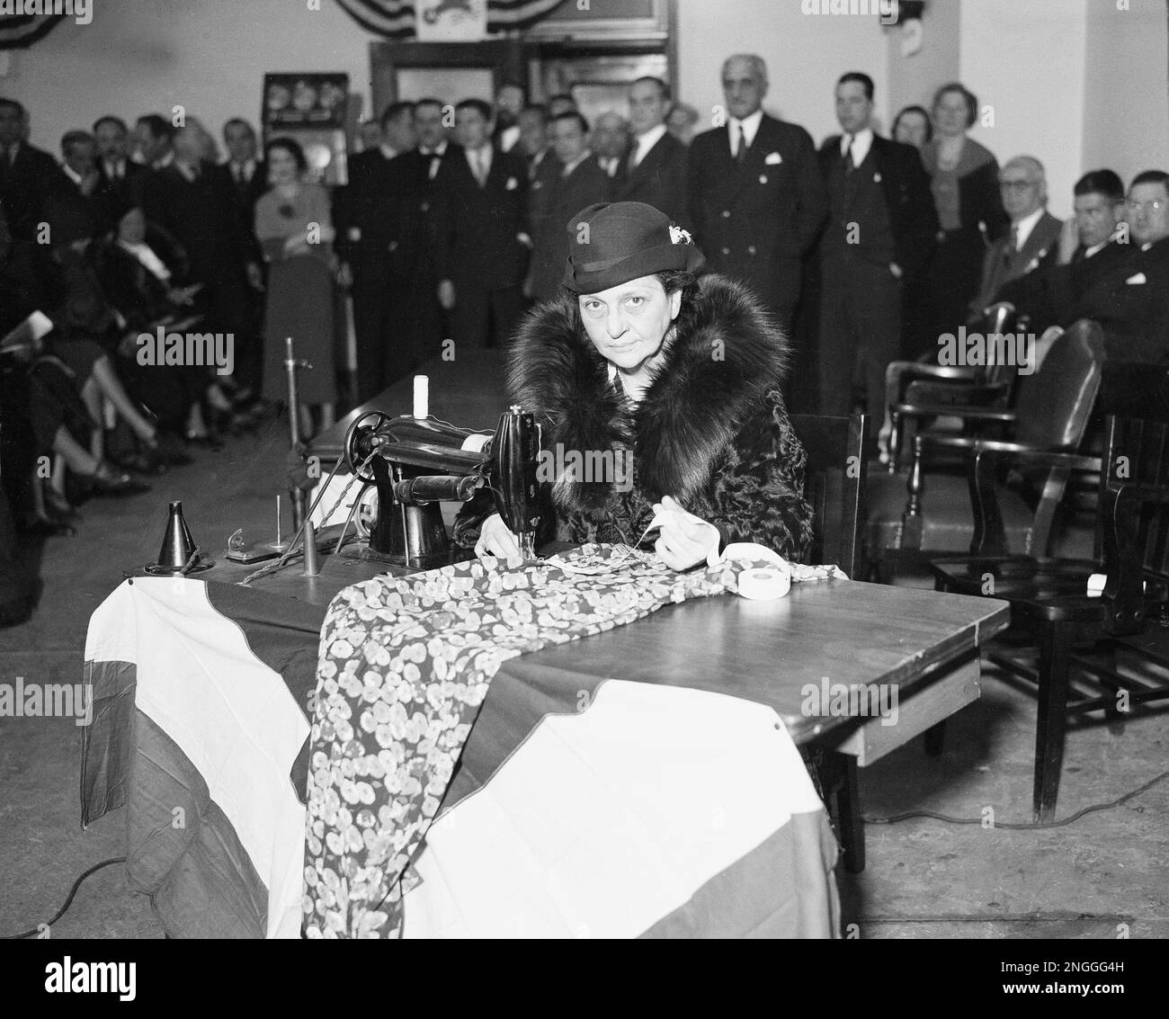 U.S. Secretary of Labor Frances Perkins stitches the first Blue Eagle ...