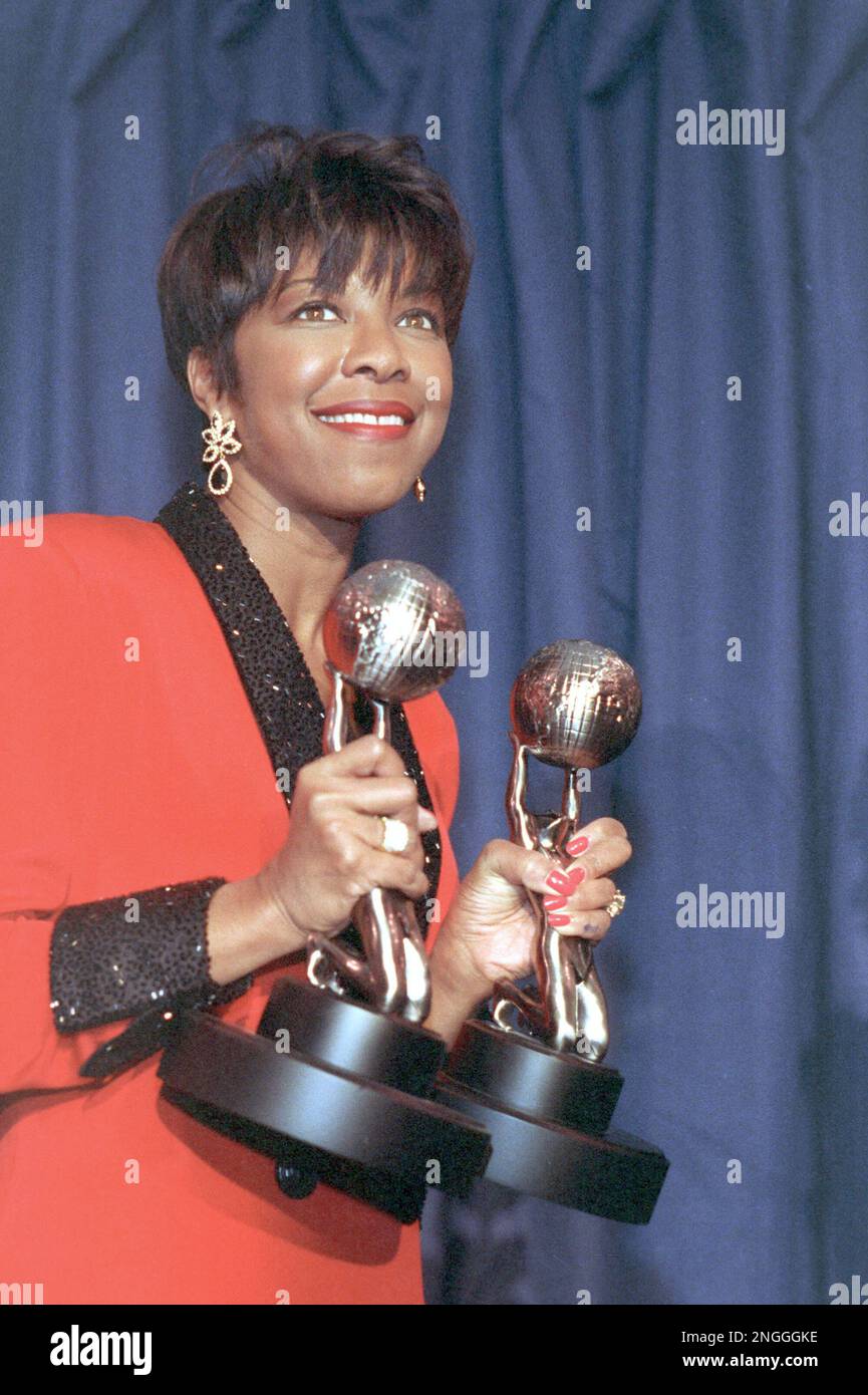 Natalie Cole holds two of her three NAACP Image Awards she won during ...