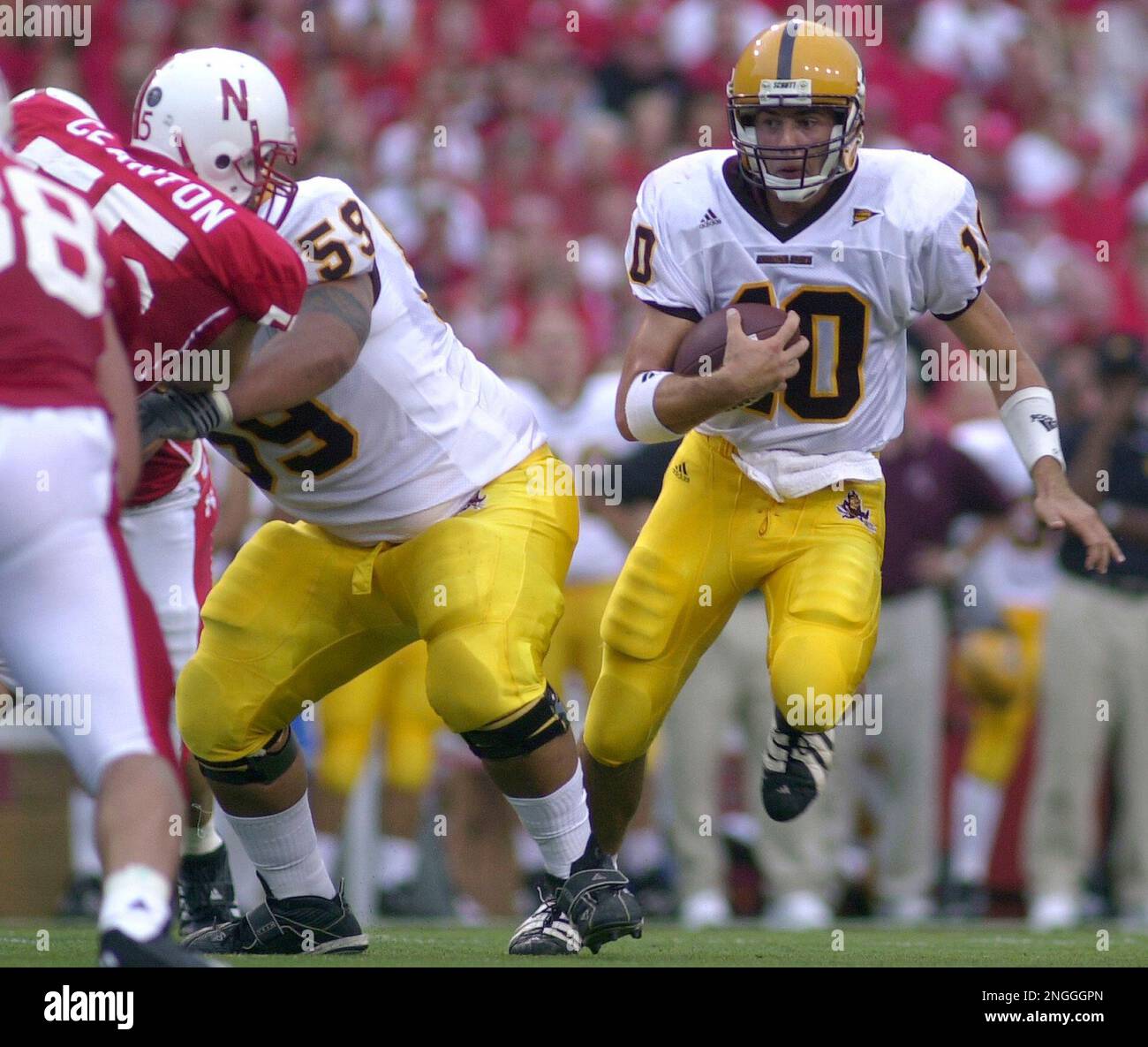 Arizona State quarterback Chad Christensen (10) gets some running room ...