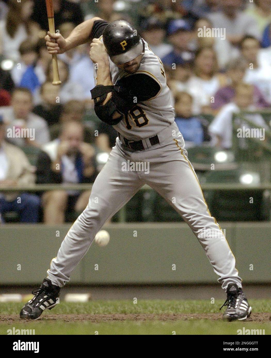 Pittsburgh Pirates' Jason Kendall is hit by a pitch from Milwaukee ...