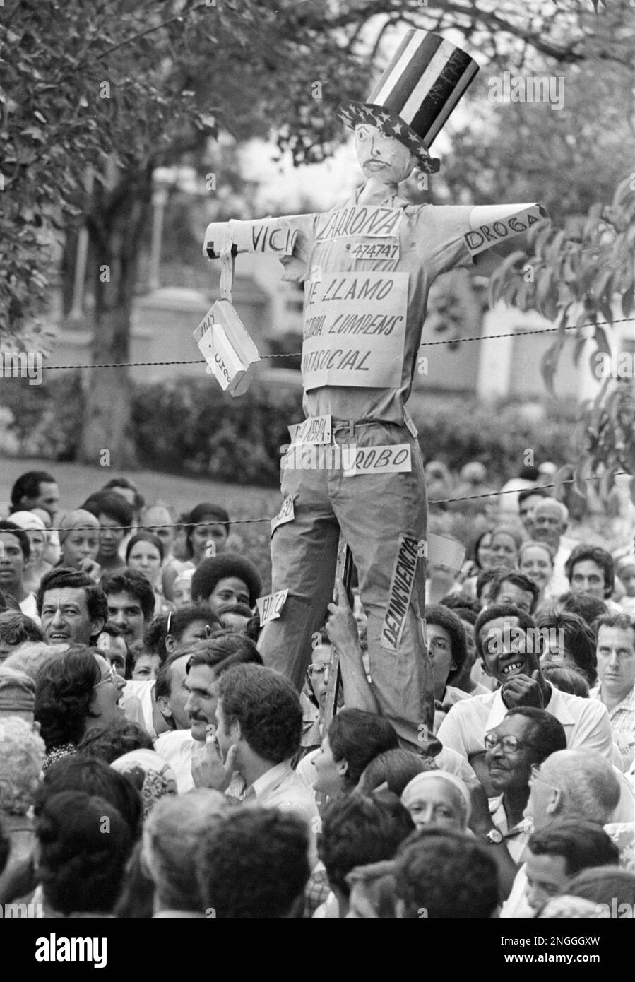 Cuban demonstrators surround an effigy of Uncle Sam outside the ...