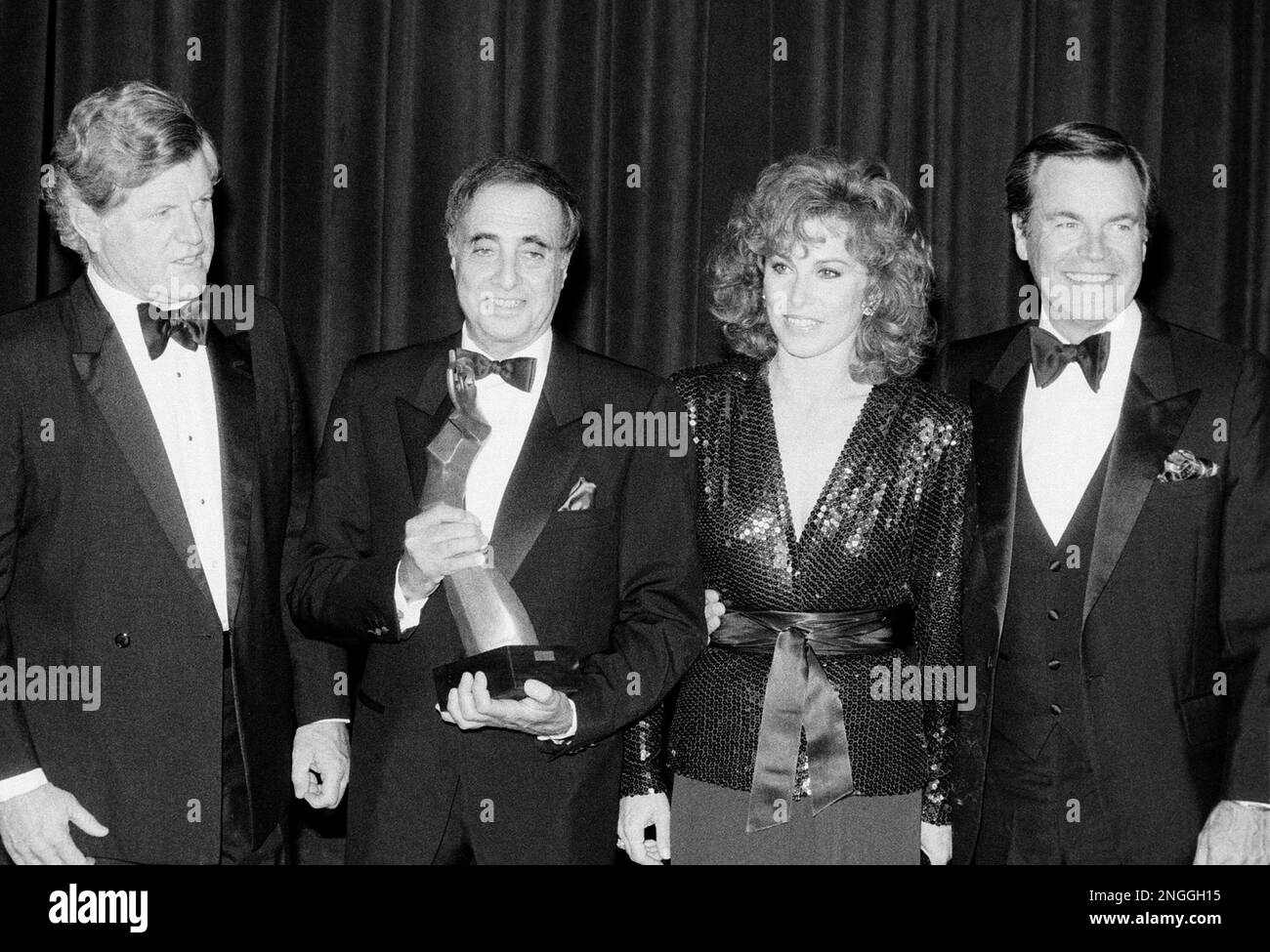Stan Kamen, center, William Morris agency motion picture department ...