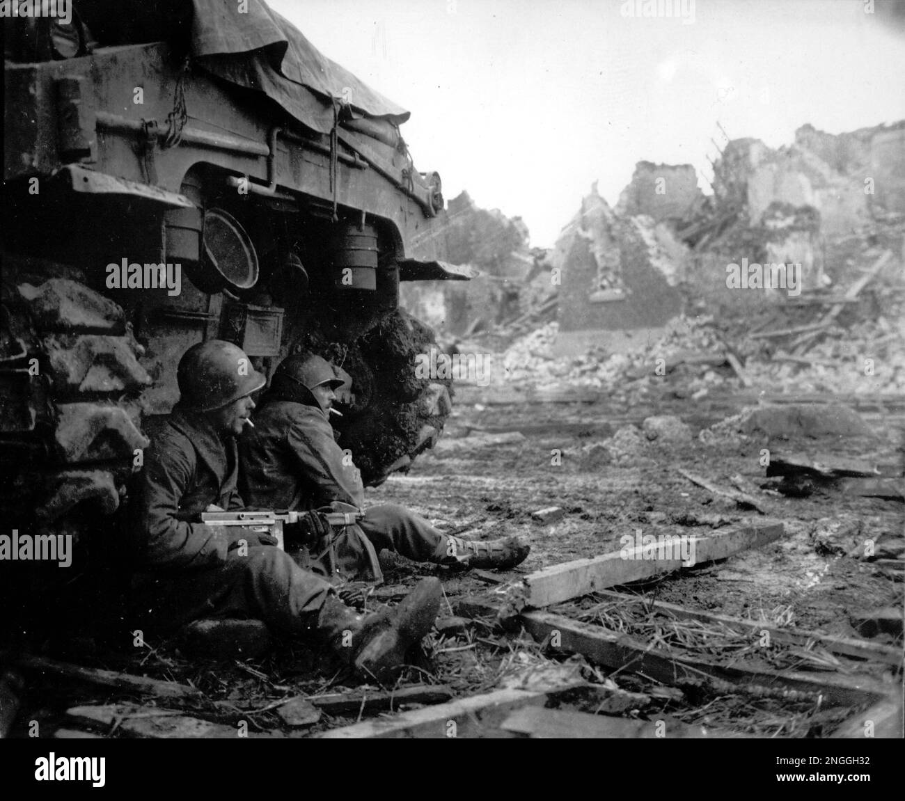 On their advance into Germany, American infantrymen are seeking cover ...
