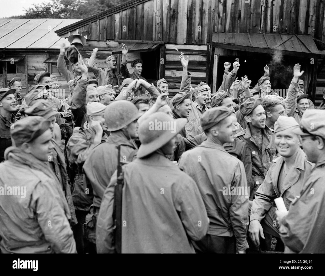 American airmen at Ofuna prison camp near Yokohama, Japan, cheer the ...