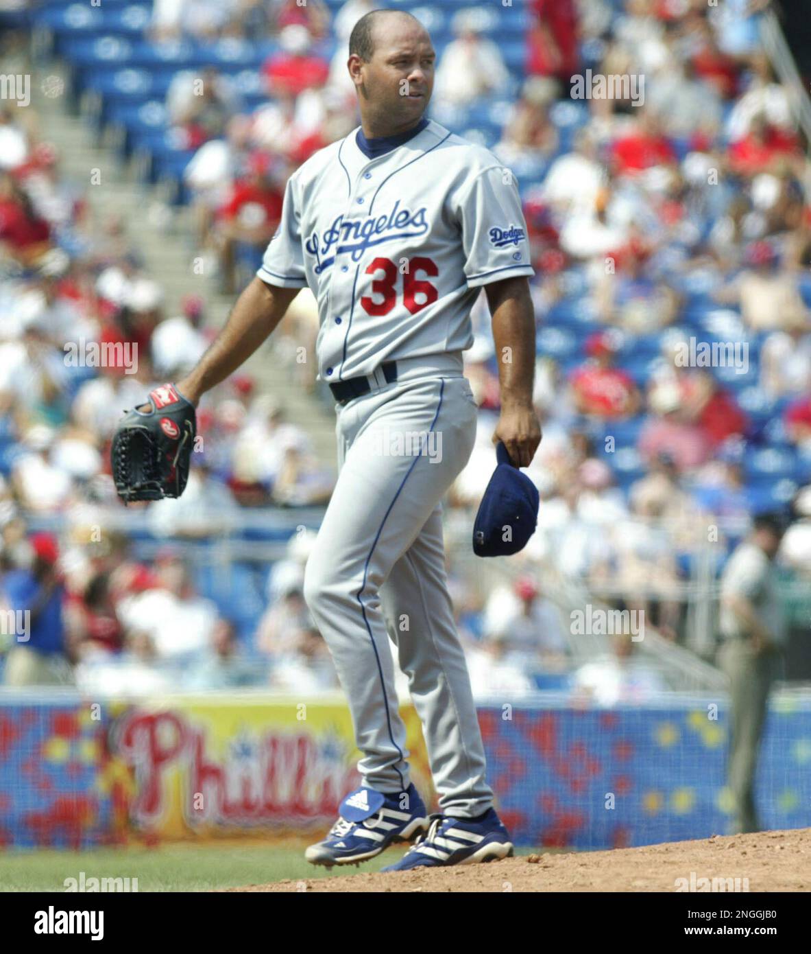 Los Angeles Dodgers pitcher Omar Daal walks off the mound after he was ...