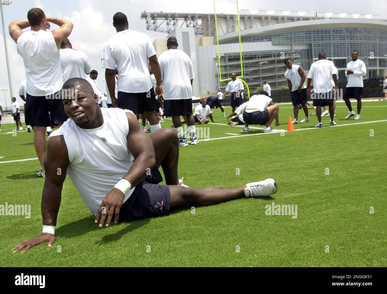Houston Texans linebacker Jason Lamar stretches before the start of ...