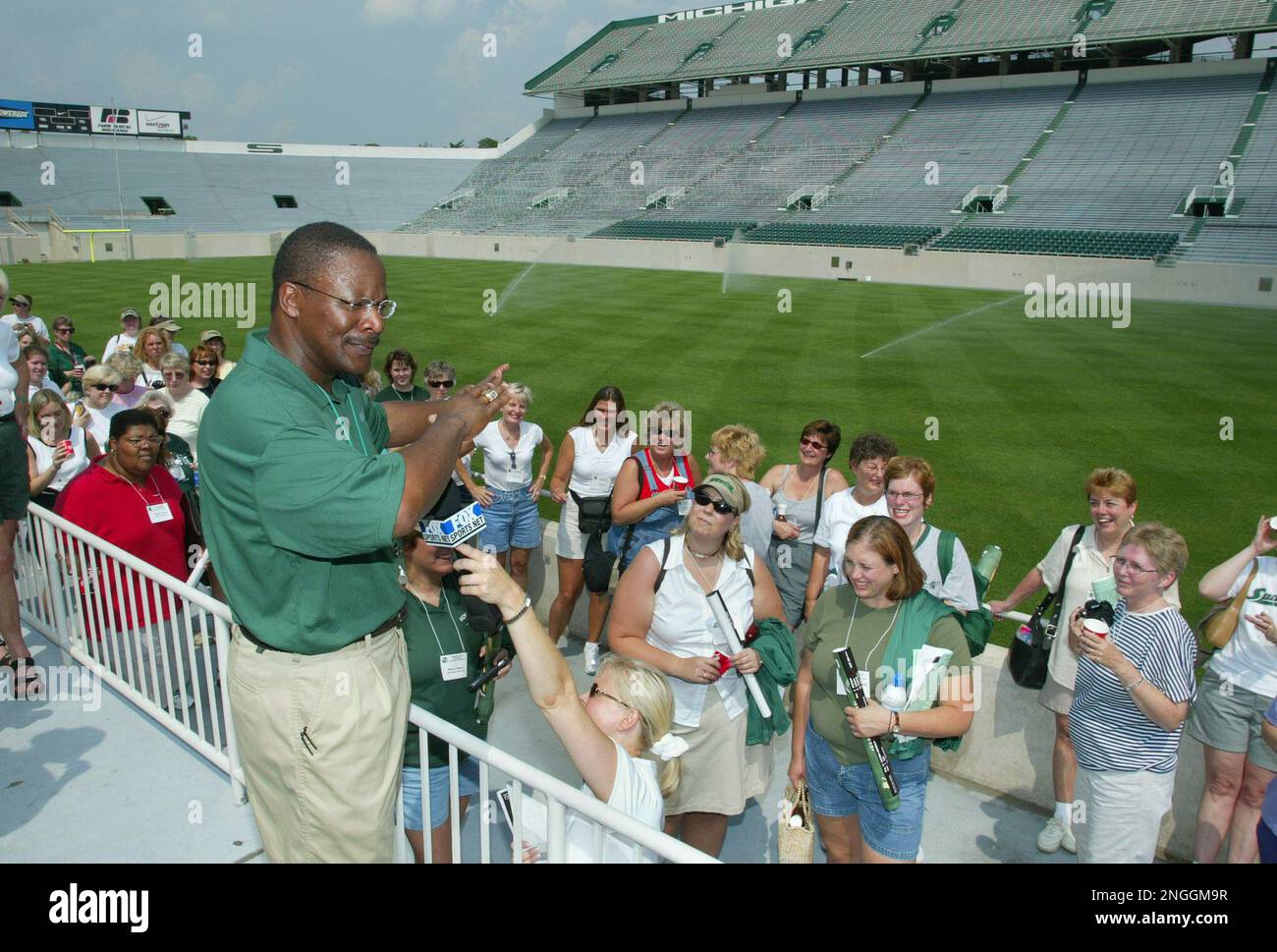 Michigan State head football coach Bobby Williams, left, talks with ...