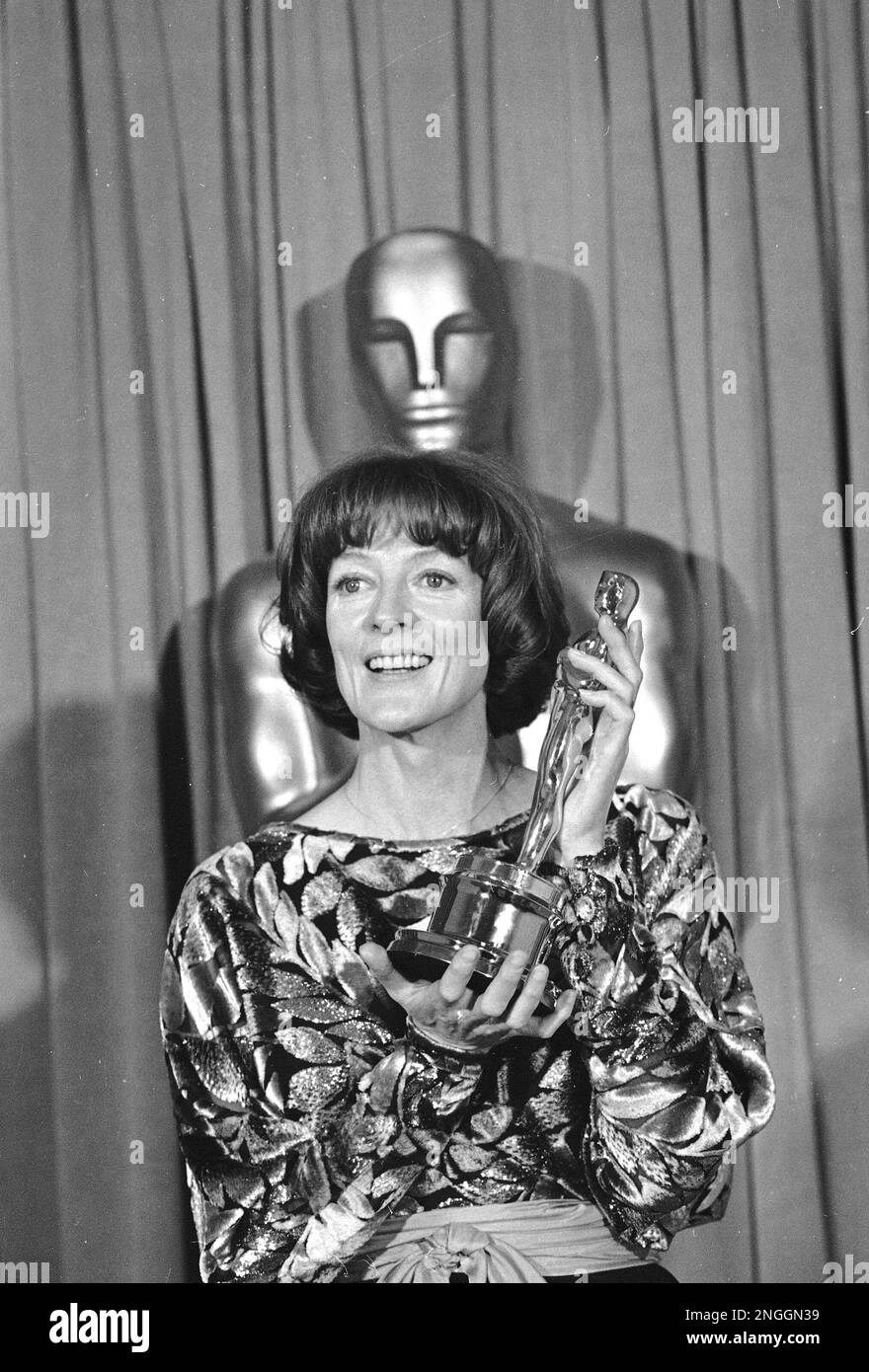 Actress Maggie Smith accepts her Oscar for best supporting actress for ...