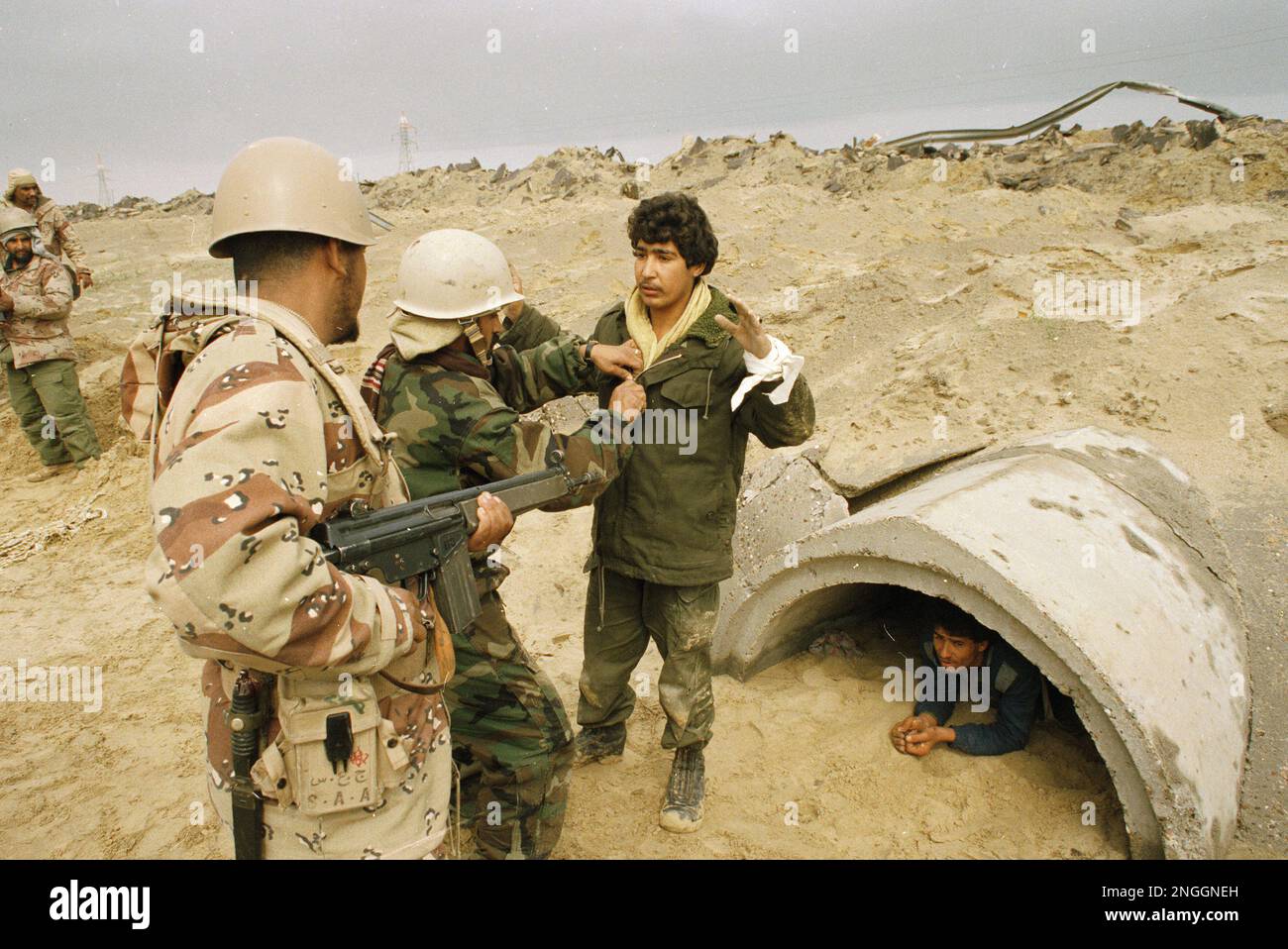 Iraqi troops emerge from heavily protected bunker to surrender to gun ...