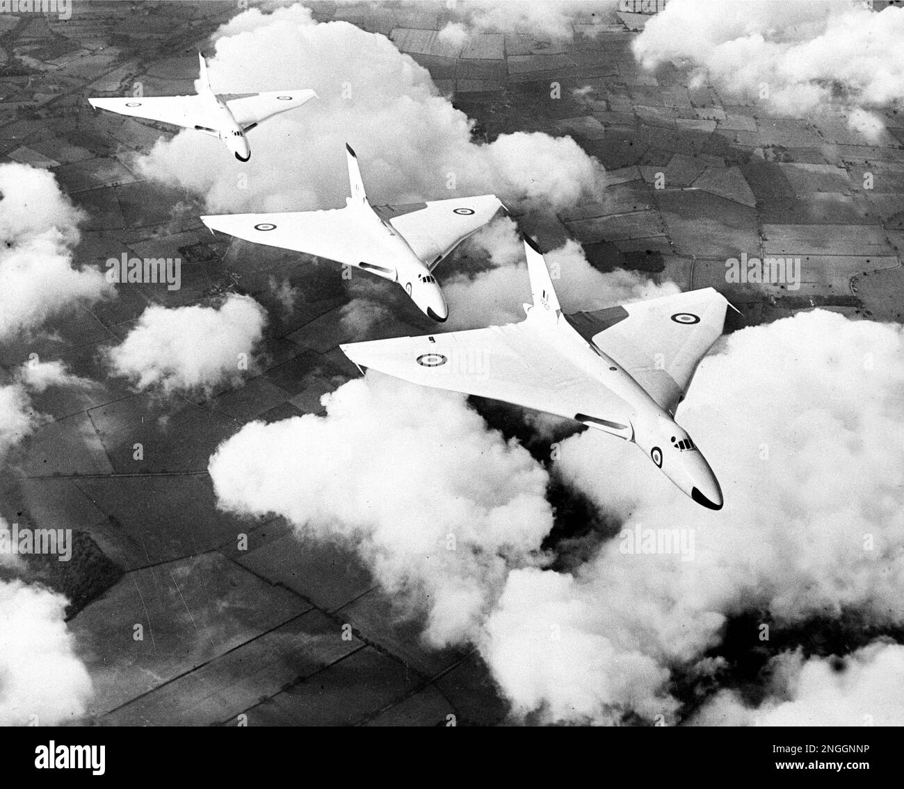 Three Avro Vulcan bomber planes of the British Royal Air Force fly over ...