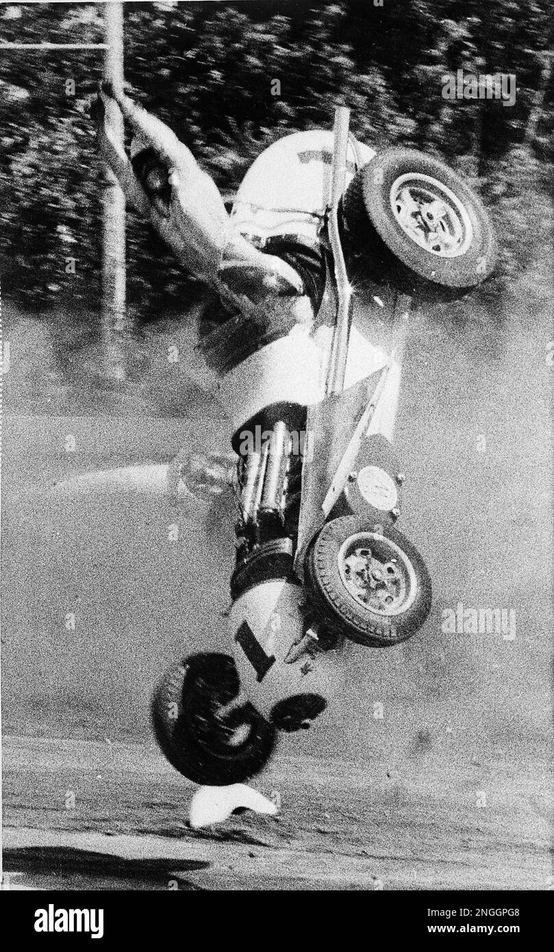 Jimmy Bryan, winner of the 1958 Indianapolis 500-mile race, is strapped ...
