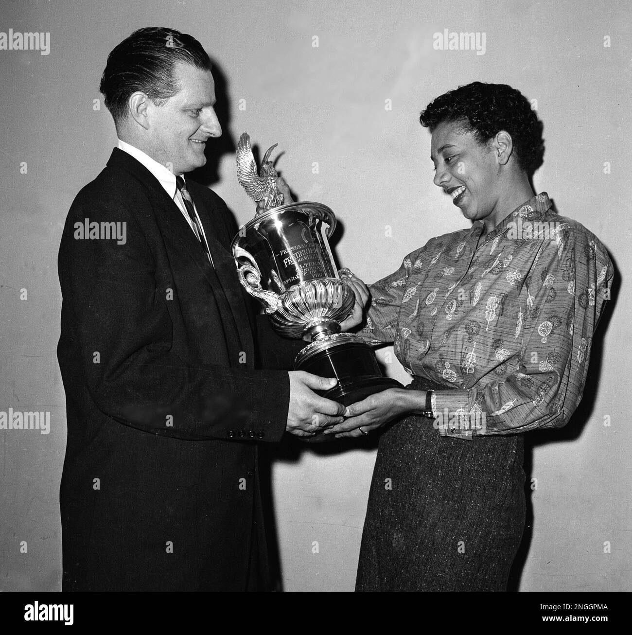 Althea Gibson, Wimbledon and U.S. Open champion, is presented the ...