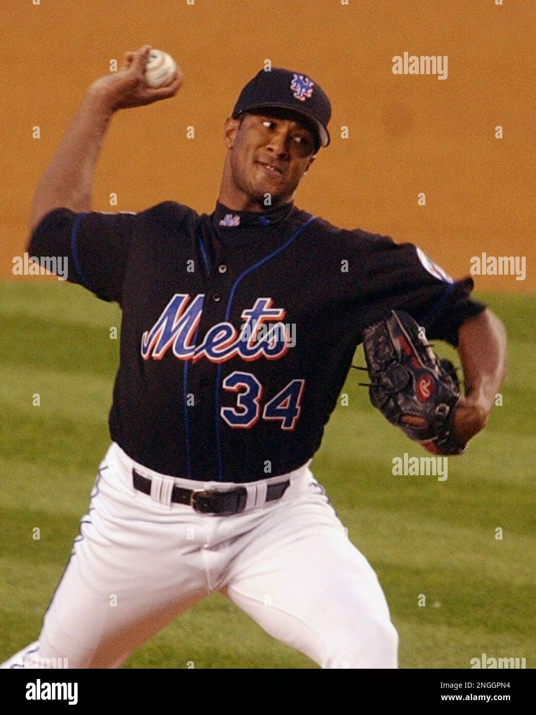 New York Mets starter Pedro Astacio delivers a pitch in the first ...