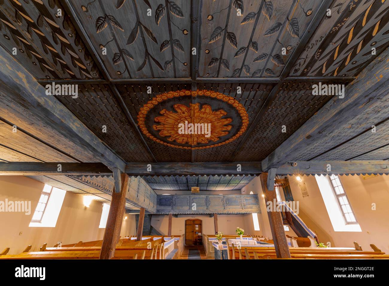Interior of a medieval church. The inside roof made with blue colored ...