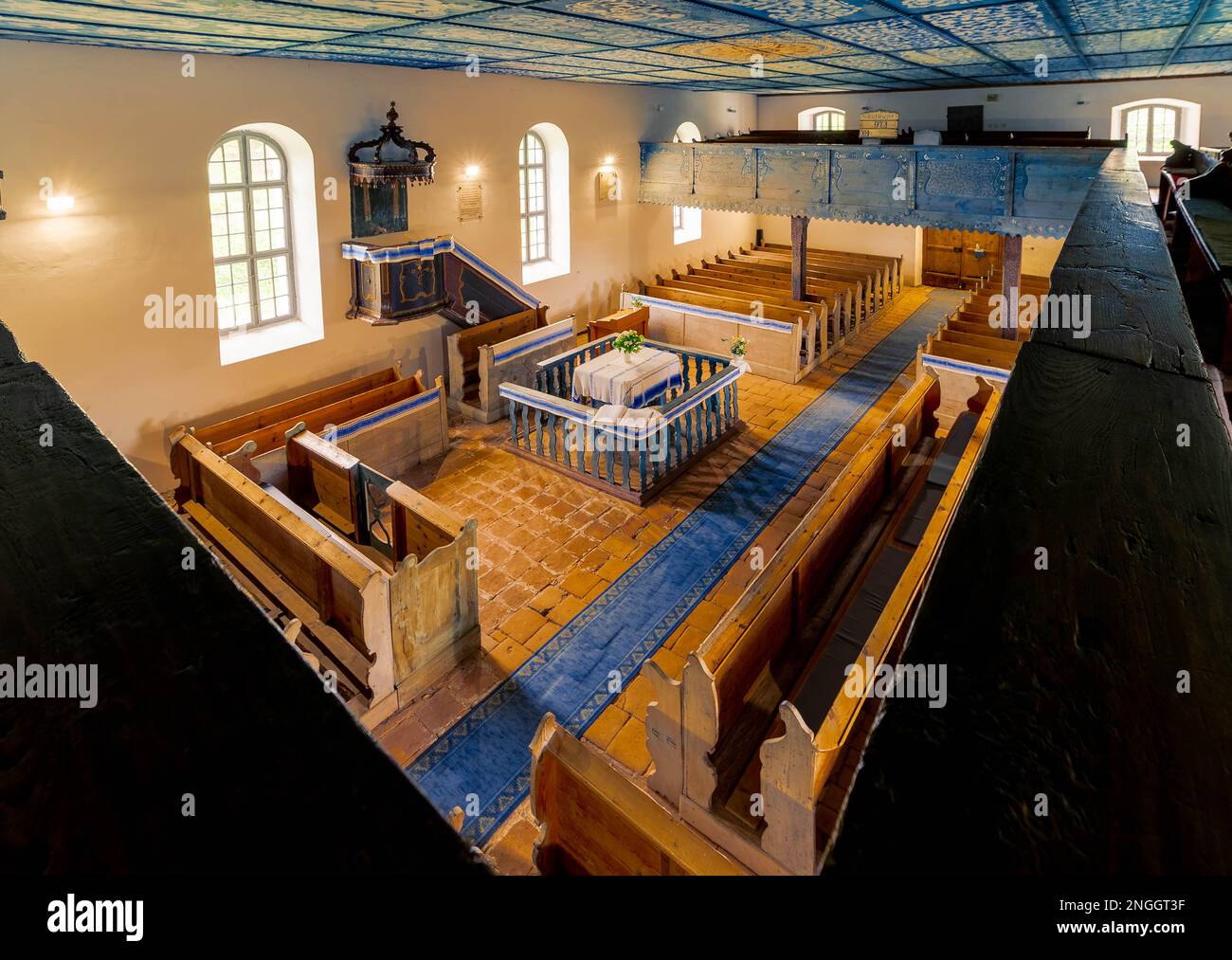 Interior of a medieval church. The inside roof made with blue colored ...